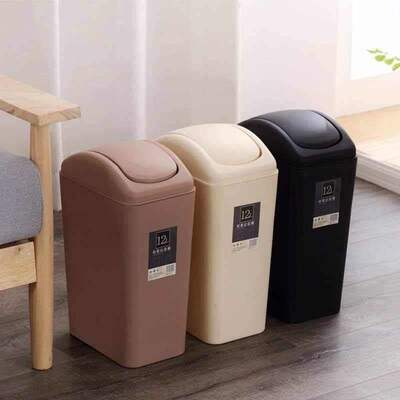 Black dustbin with cover and cover toilet paper to put in