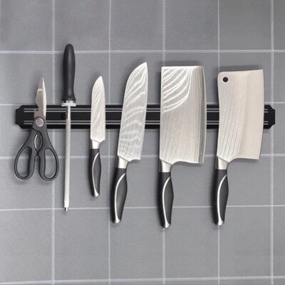 A Magnetic Wall Mounted Knife Holder, Storage Rack for Kitch