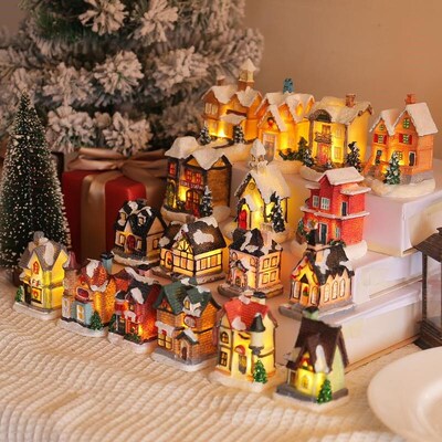 Christmas decorations, colorful glowing house tabletop