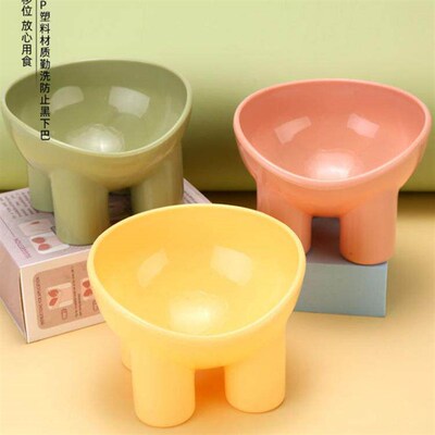Slanted high-footed pet bowl for cats, designed to protect t