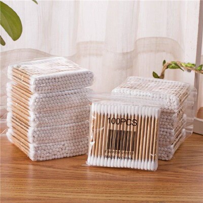 Double-headed disposable cotton swab ear-pulling cotton swab