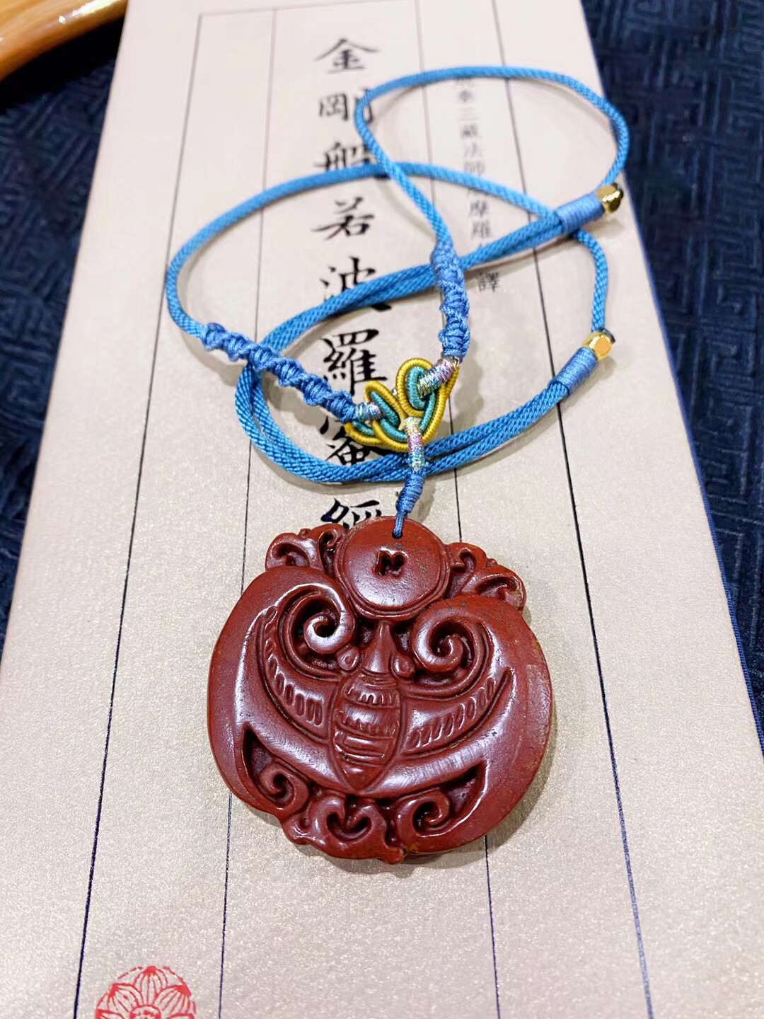 泗滨正品红砭石 福到眼前吊坠 手工打磨 砭石吊坠 原石打磨吊坠