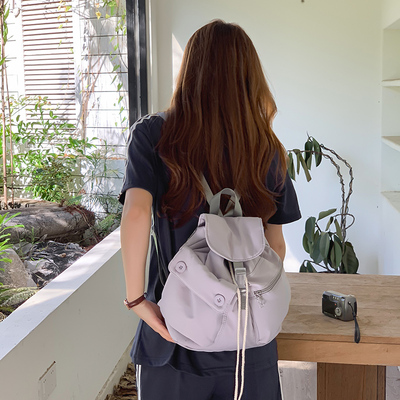 韩国小众设计口袋纽扣抽绳双肩包tensedance同款尼龙背包户外休闲