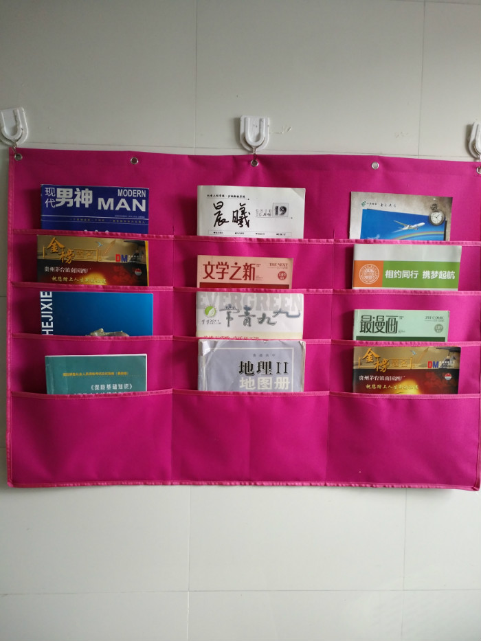 定制新款12格图书宝宝A4绘本杂志书本办公资料全牛津布收纳墙挂袋