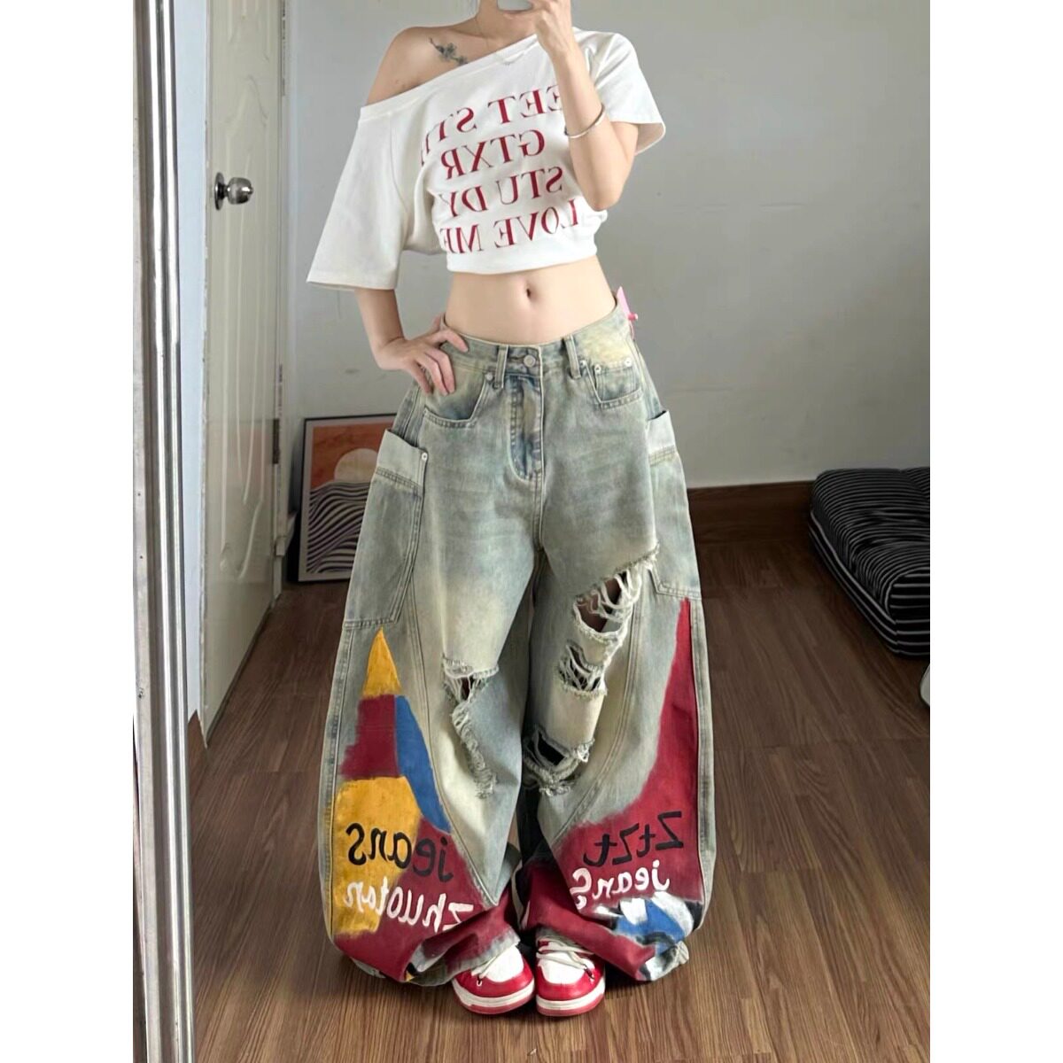 高街休闲复古涂鸦破洞做旧牛仔裤女2026秋季新款宽松阔腿弯刀裤