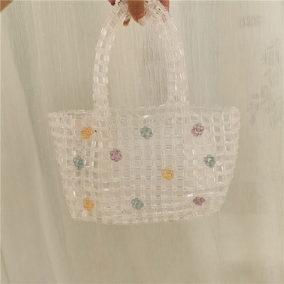 旅行镂空编织串珠手提包新品