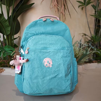 2025K猴子包都市简约尼龙侧袋旅行包多隔层双肩背电脑包K21305