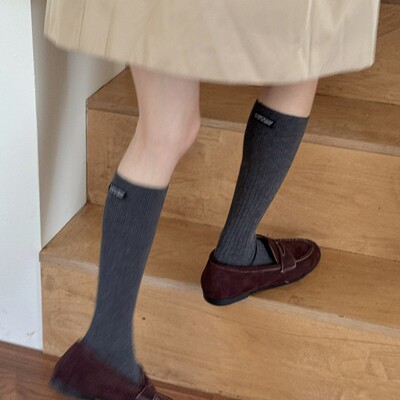 ioulor秋冬韩系小腿袜带字母标休闲纯色有氧棉堆堆袜诸暨袜子