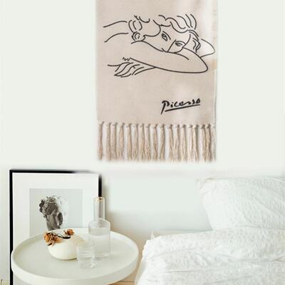 In the bedroom, a walled blanket with a bedside decoration o