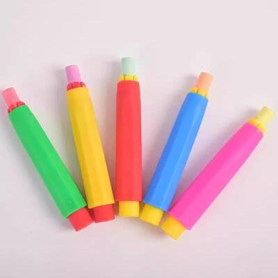 New chalk holder design, keeps hands clean, made of teaching