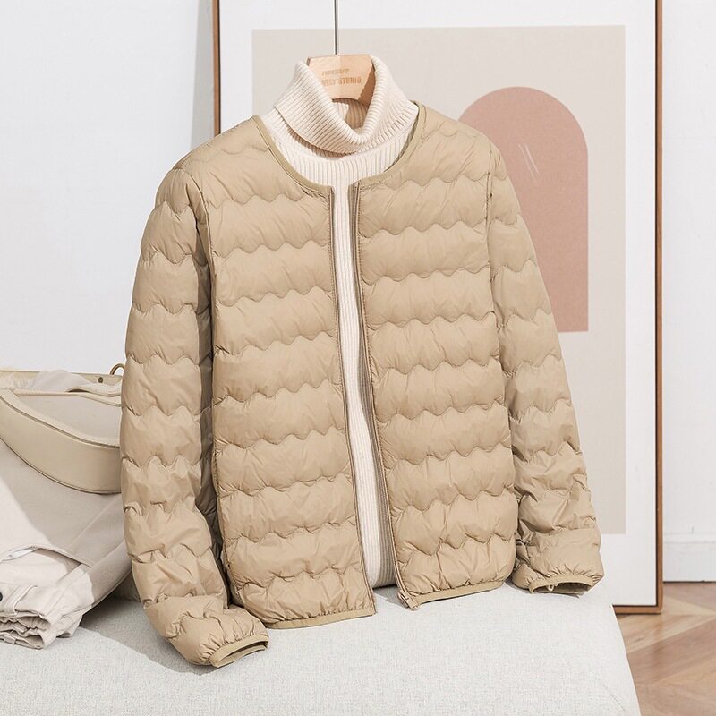 唯品会特卖断码清仓特价处理轻薄白鸭绒羽绒服女装品牌正品春秋冬