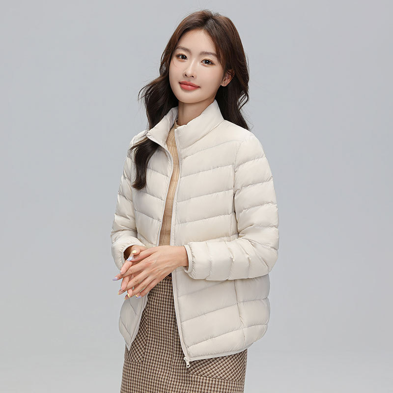 唯品会特卖断码清仓特价处理轻薄白鸭绒羽绒服女装品牌正品春秋冬