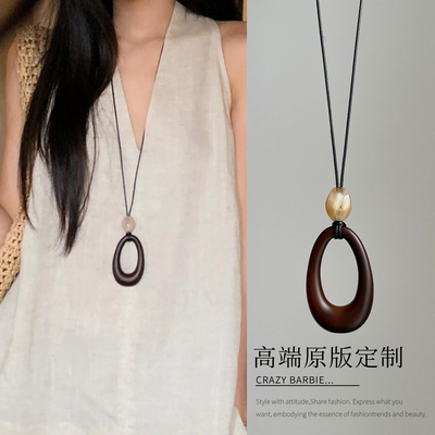 黑皮绳木质椭圆长款项链毛衣链女
