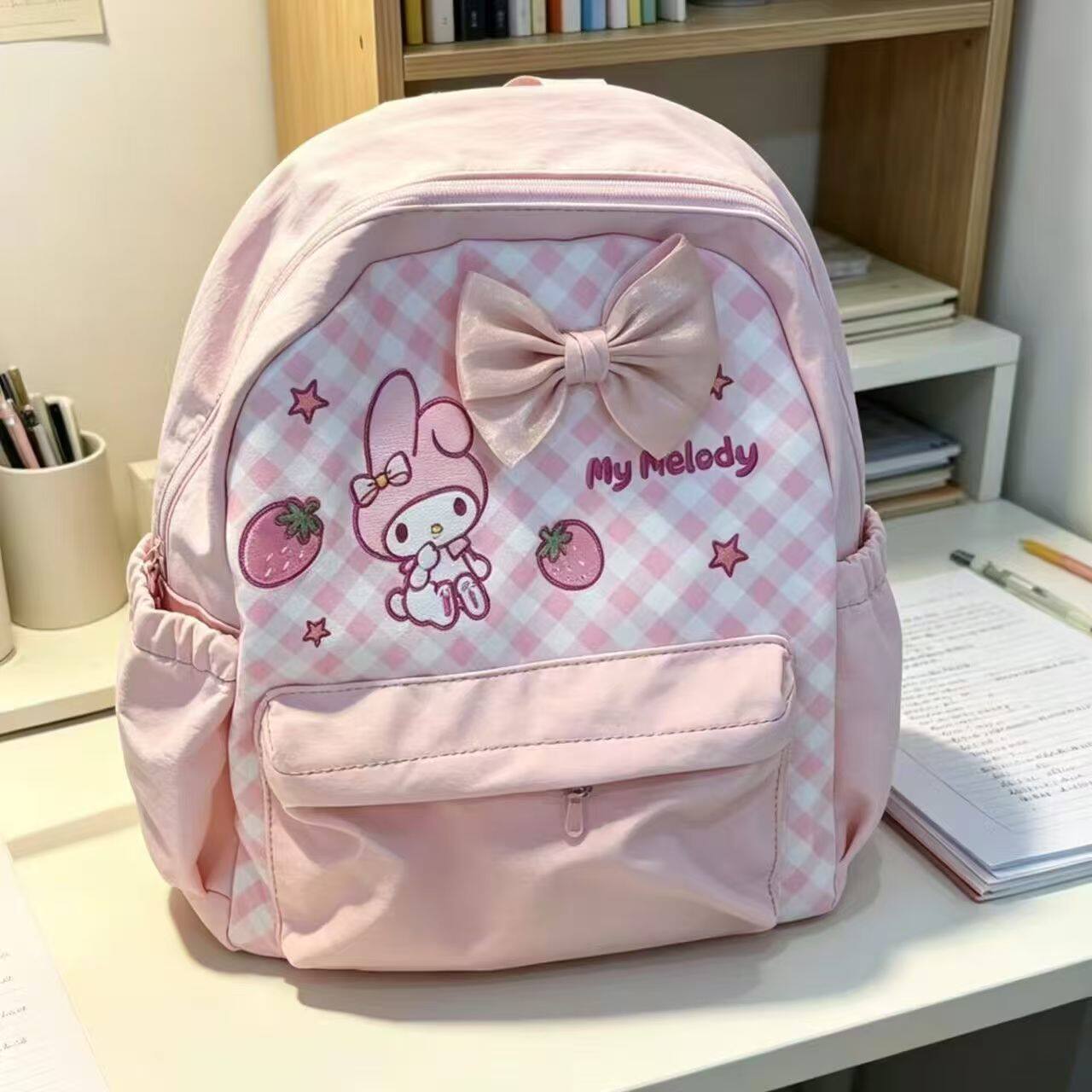 日系美乐蒂双肩包女学生可爱格子书包大容量轻便校园百搭卡通背包