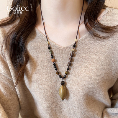 黑色串珠橄榄吊坠皮绳项链女款长款毛衣链大气高档高级感2025新款