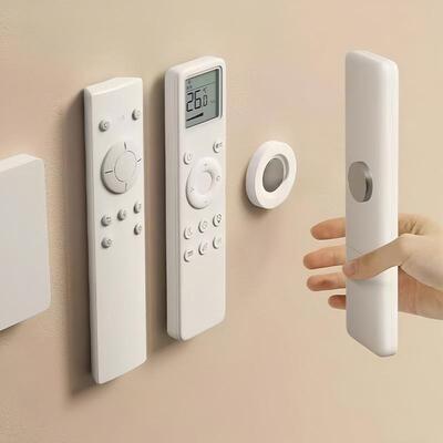 Wall-mounted magnetic strip for remote control storage, no d