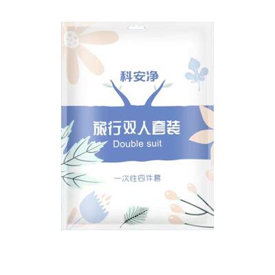 A set of four travel bedding items, including disposable bed
