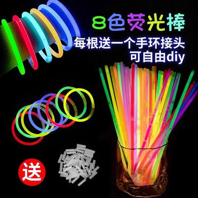 Fluorescent sticks that adhere to clothing, glowing children