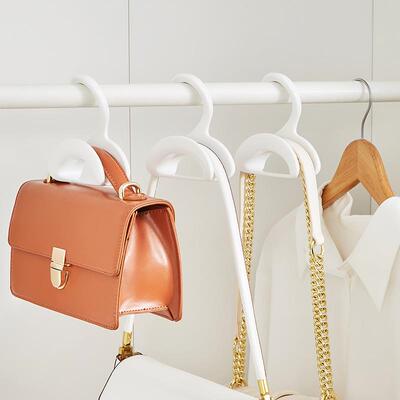 New bag hanger that doesn't damage the straps, versatile for