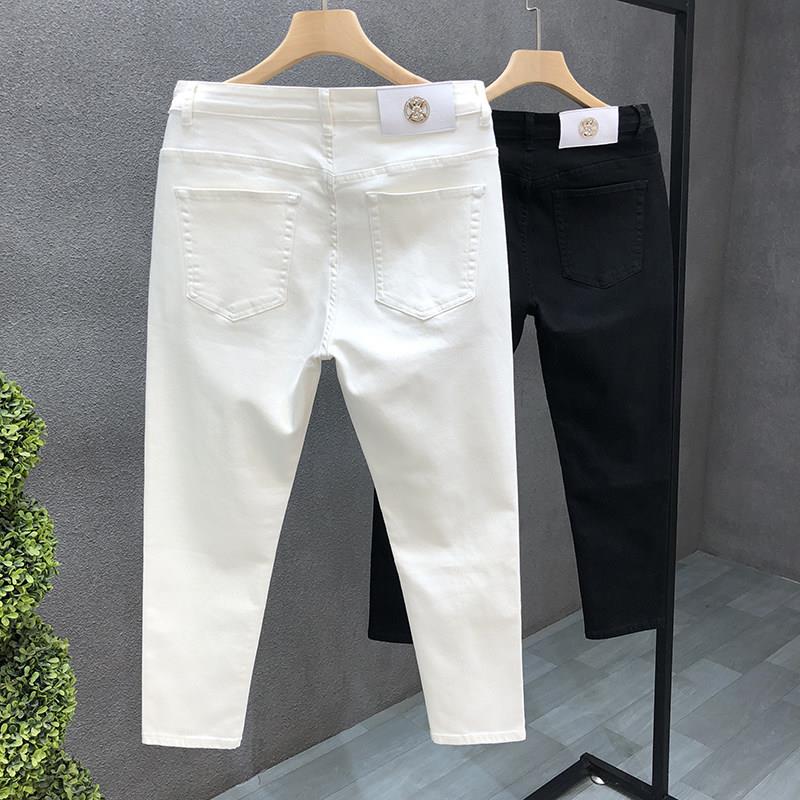 白色牛仔裤男潮牌高端春秋款修身小脚男士韩版潮流棉质弹力九分裤