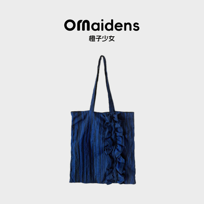 橙子少女小众设计蓝色褶皱布包