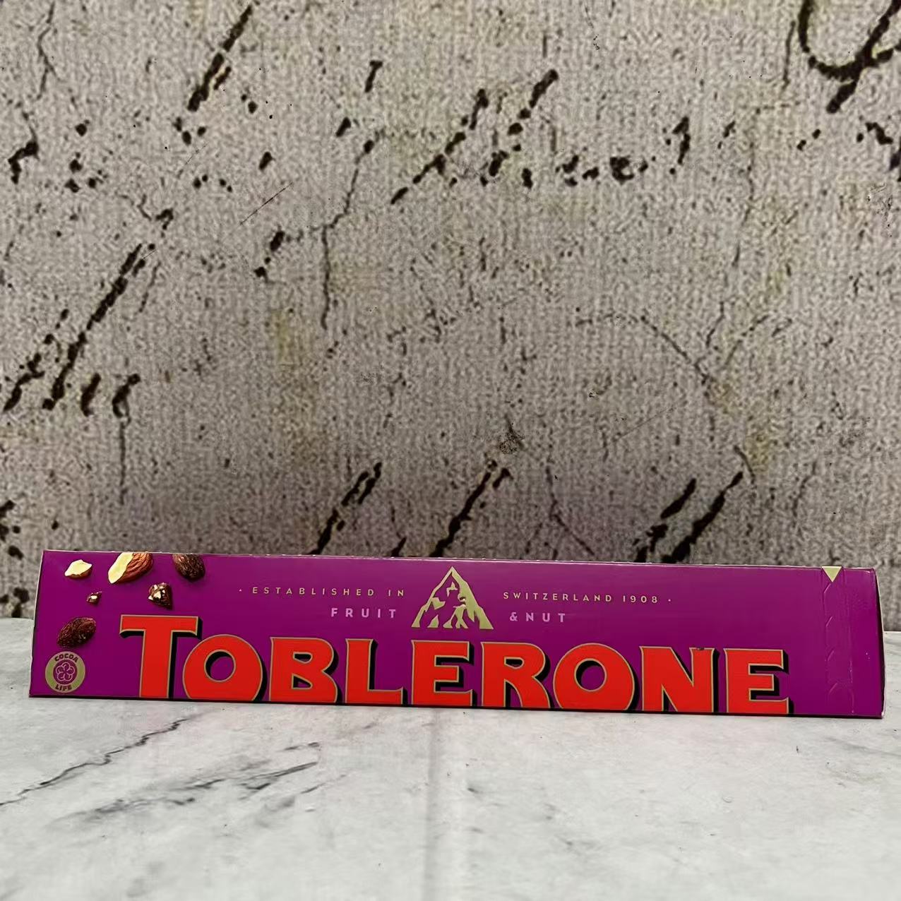 临期特卖 瑞士进口 牛奶巧克力制品含葡萄干蜂蜜及巴旦木糖100g