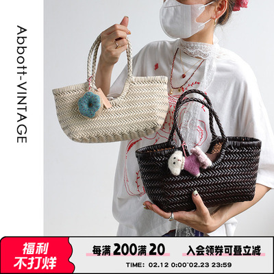 牛皮编织手提斜挎度假包菜篮包