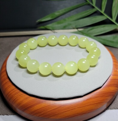 Z041604 新疆的猫45.0克R12顶细超冰润冒油“宝石级”黄口玉手串