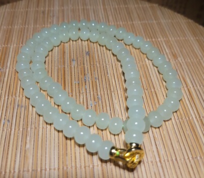 zg032606 新疆的猫47.1克油糯纯美夹层料和田玉晴水算盘珠项链