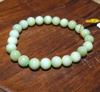 YQ122608 17.5克，直径8mm肉质细腻宝光湛然的黑羊洞碧玉圆珠手链