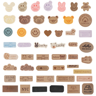 自粘印花皮标布标布贴服装辅料