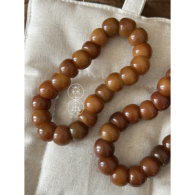 森未央「满糖」 14mm玉化蒜瓣大肠精品浓郁焦糖色菩提根手串