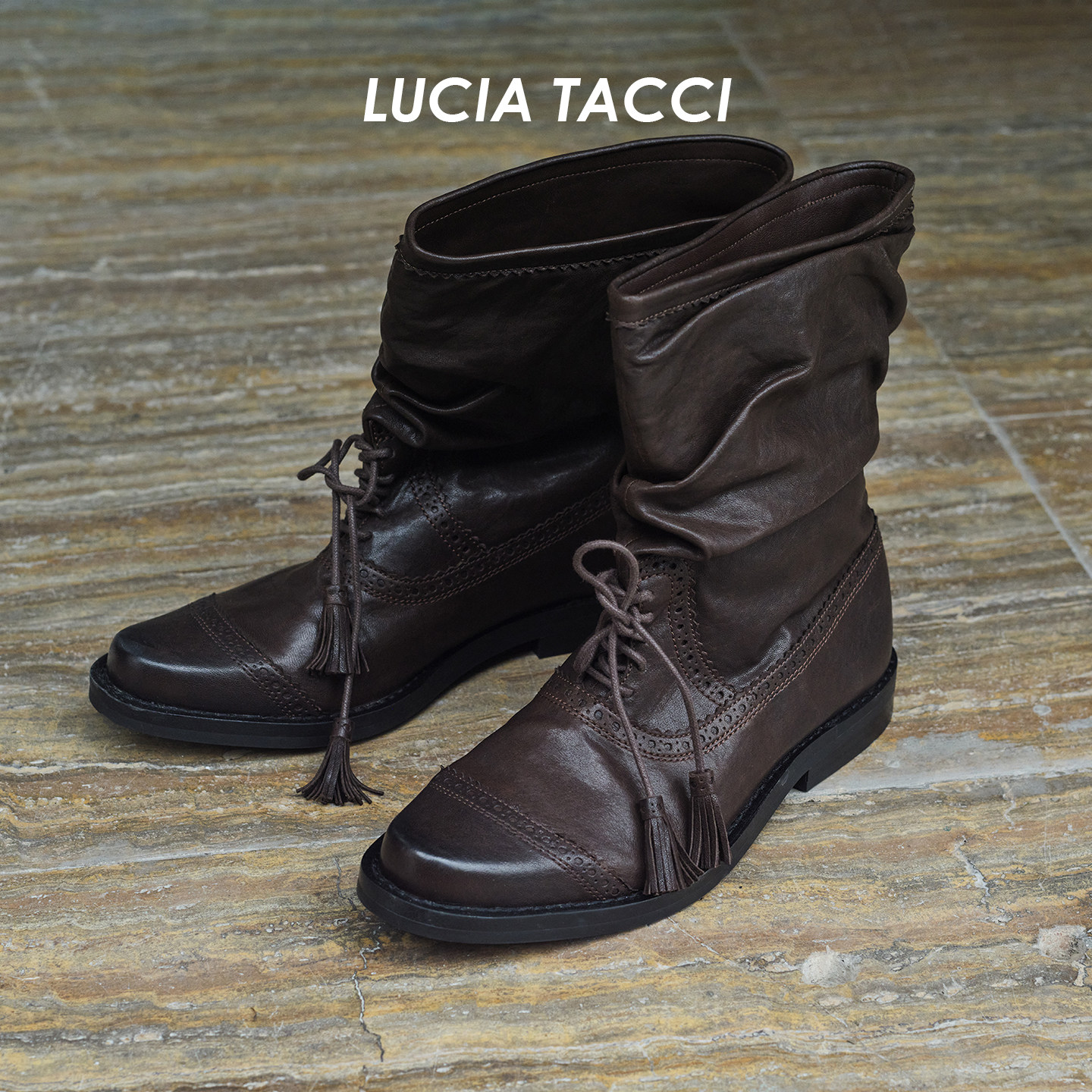 LUCIA TACCI26早秋新品真皮质感复古休闲短靴西部雕花流苏马丁靴