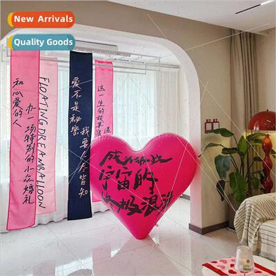 same oversized love balloon inflatable engagement arrangemen