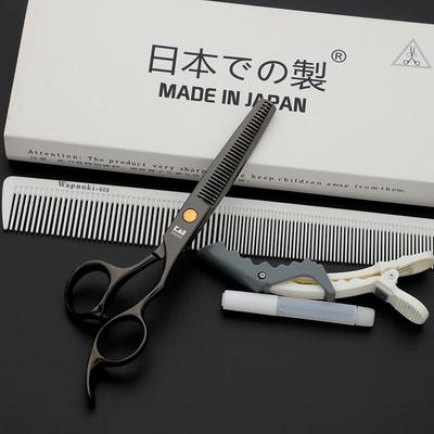 The barber scissors hair thinning is his hair cut Haircut to