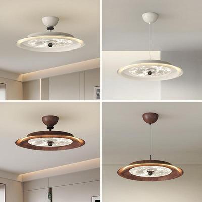 The chandeliers of the walnuts restaurant are modern, simple