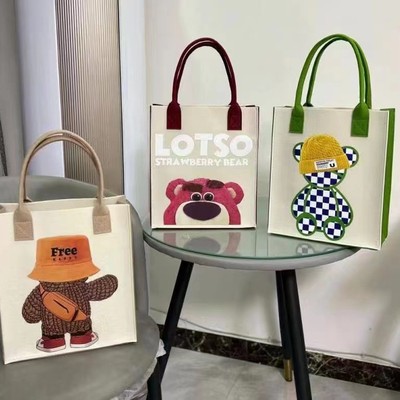 手提包卡通包毛毡袋伴手