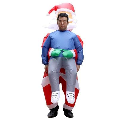 Giant Santa Claus riding reindeer, carrying people inflatabl