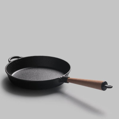 household cast iron pan with wooden handle frying pan