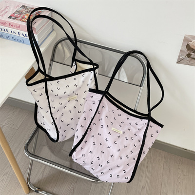 54104 大容量包包女春夏季新款单肩包休闲洋气蝴蝶结通勤托特包