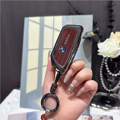 适用于宝马新款X1X3X5X6X7钥匙套7系高档iX/XM/i7包扣壳木纹