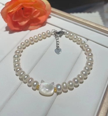 广西北海市5-6mm强光无暇近圆珍珠天然贝雕手链，小清新风格