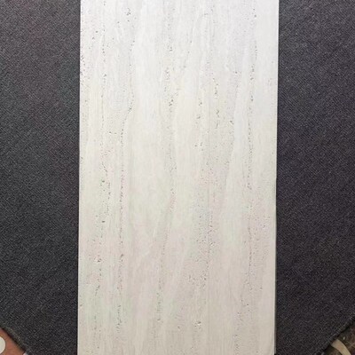 白黄色真洞洞石瓷砖600x1200客厅地砖玻化砖地板砖800x800背景墙