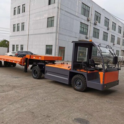 Heavy duty seated semi-trailer electric tractor with brake