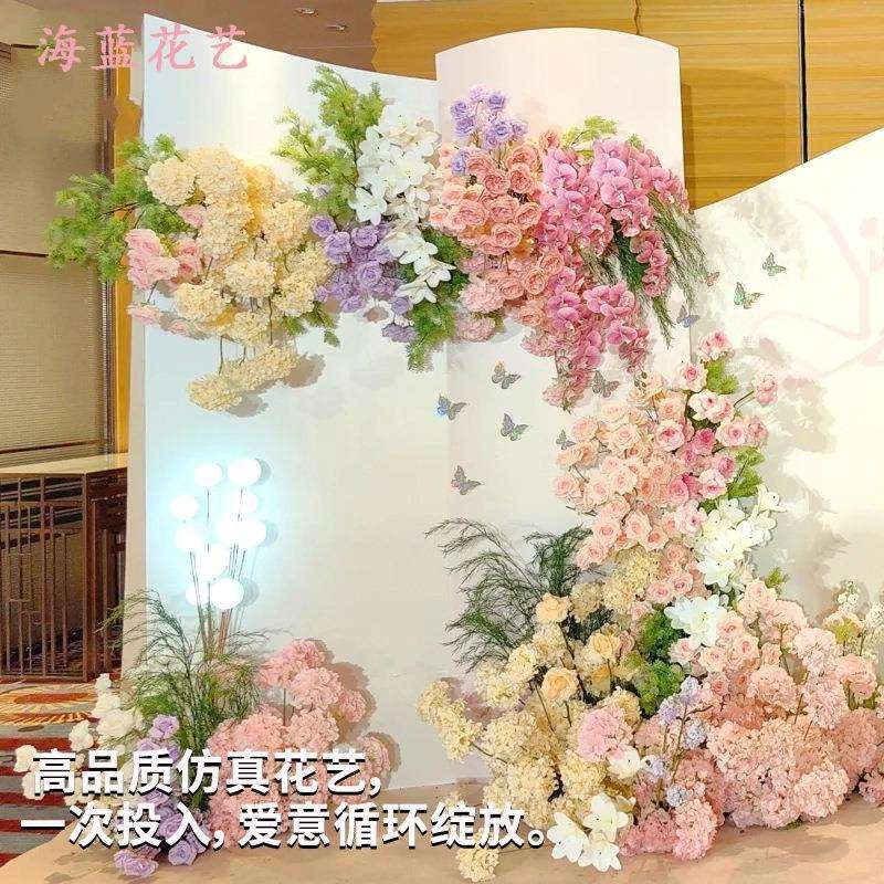 粉色挂花婚庆场景布置仿真地排花装饰花艺法式浪漫婚礼主舞台