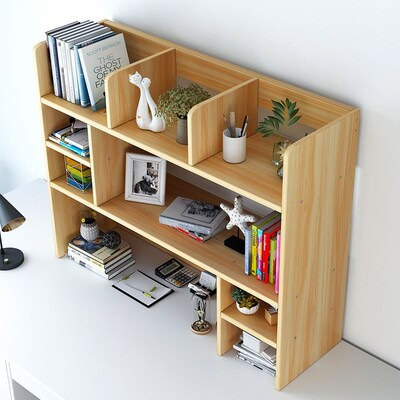 The bookshelf desk holds a simple student desktop bookcase