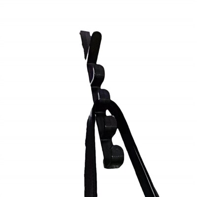 Behind the door, a long row of hooks serves as a bag hanger
