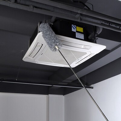 Retractable electrostatic duster for cleaning ceilings