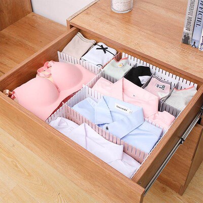 Drawer organizer with adjustable dividers and compartments.
