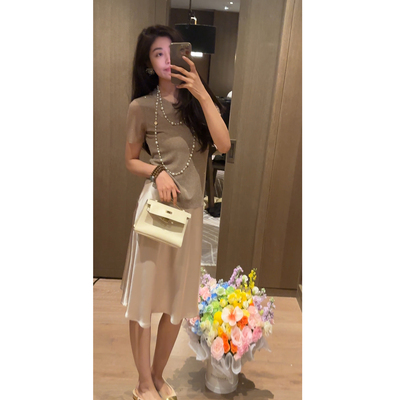 2N.COU妮蔻26春新款光泽垂感醋酸显瘦半身裙女气质高腰A字短裙